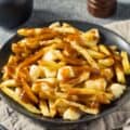 Homemade Poutine Recipe | Authentic Canadian Poutine - TwoSleevers
